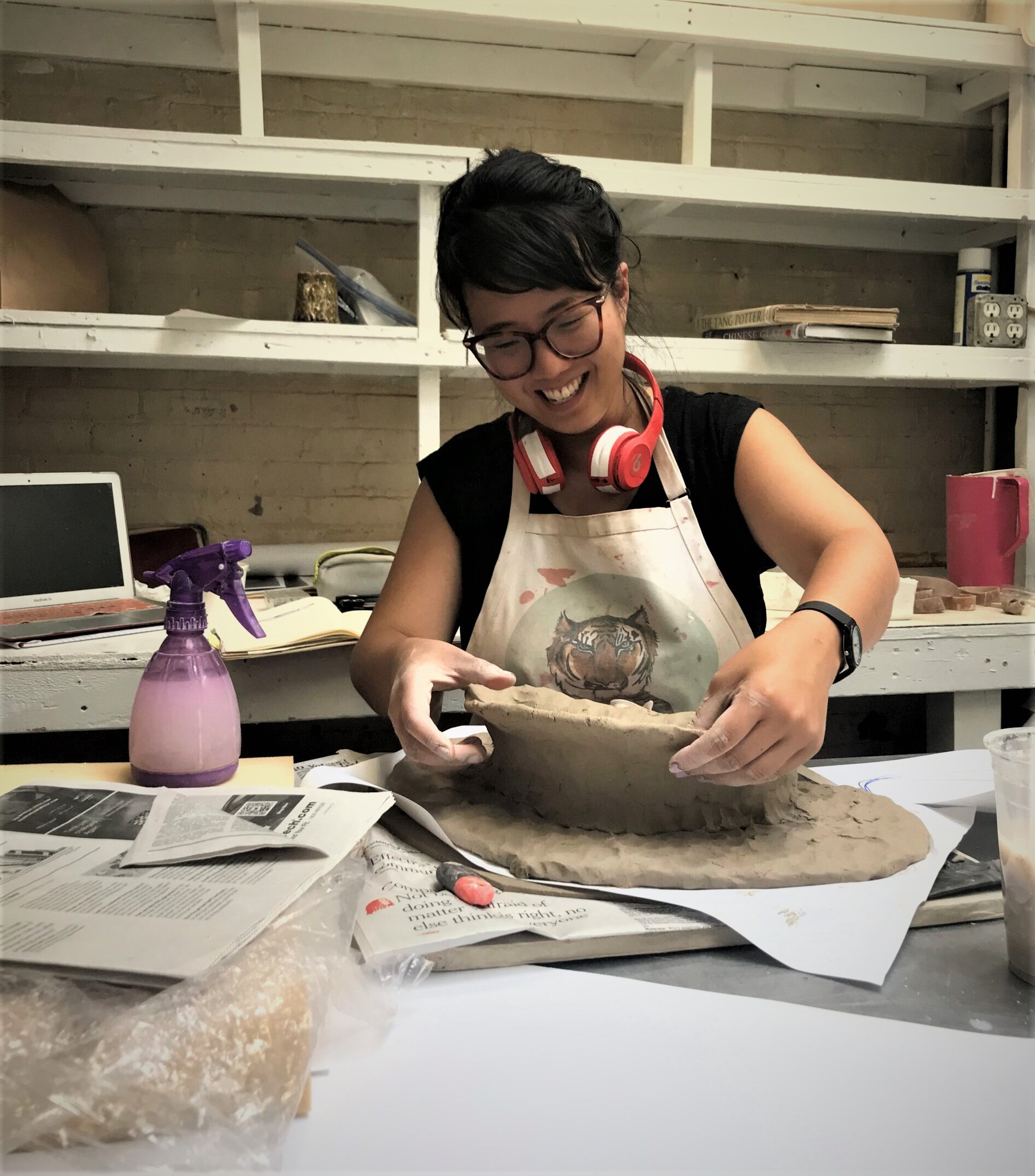 Greenwich House Pottery Fellowship Artist Cathy Lu works on a new ...